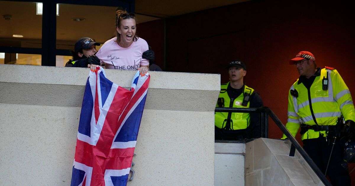 Woman Arrested After Flying Union Flag at Epping Council Building Amid ...